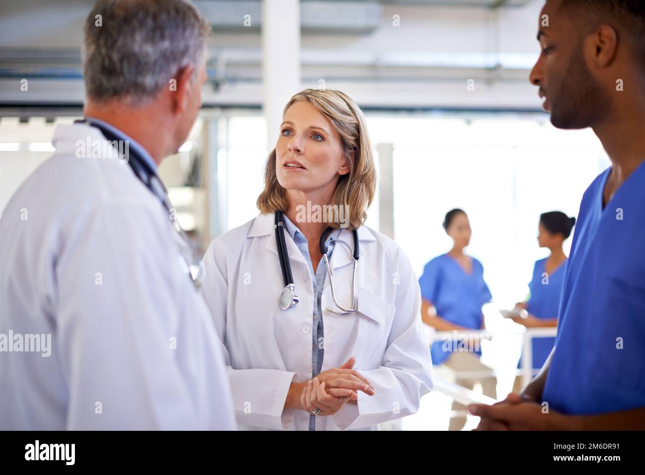 Getting input from a colleague. a group of medical professionals ...