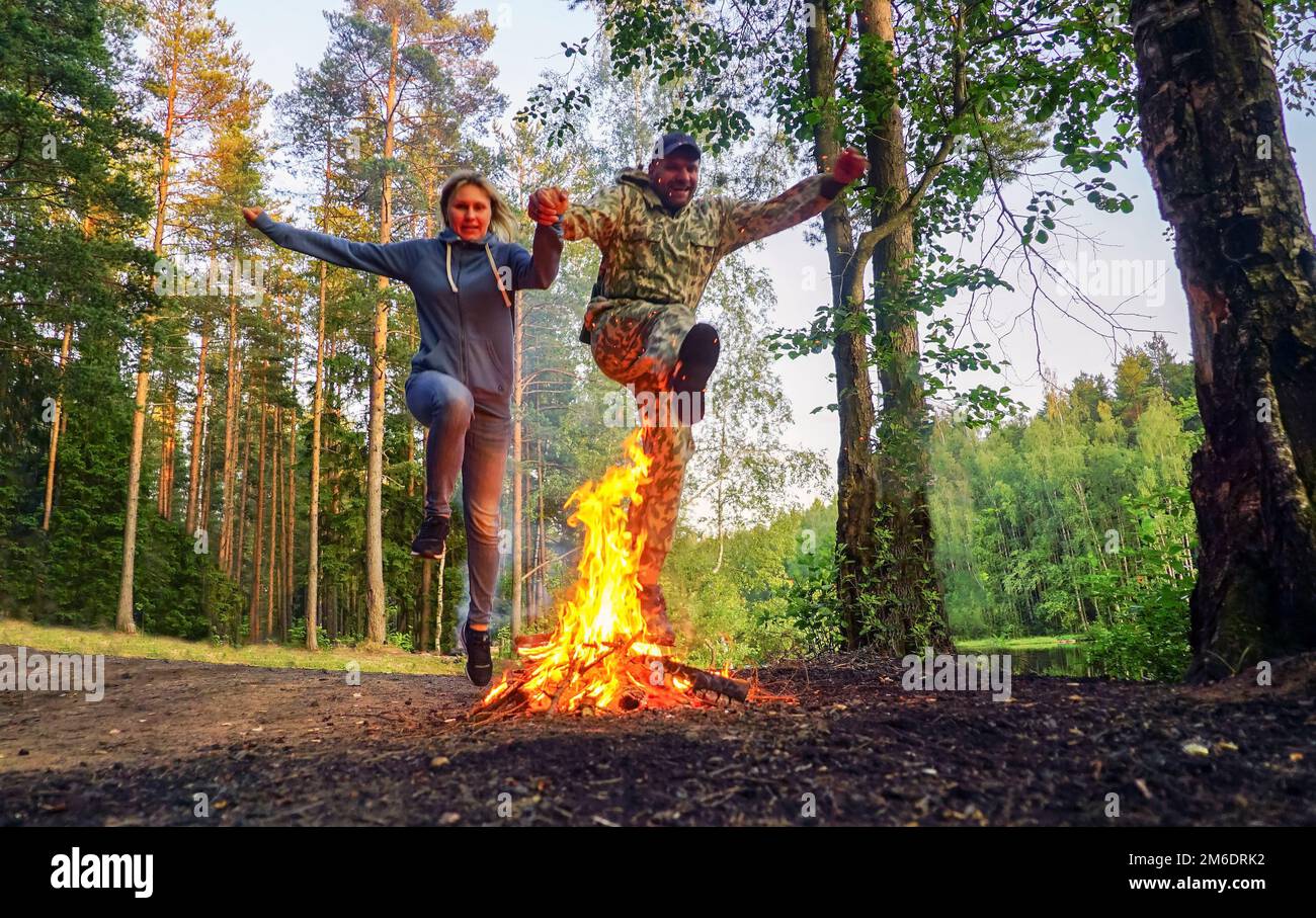 Man jumping over campfire hi-res stock photography and images - Alamy