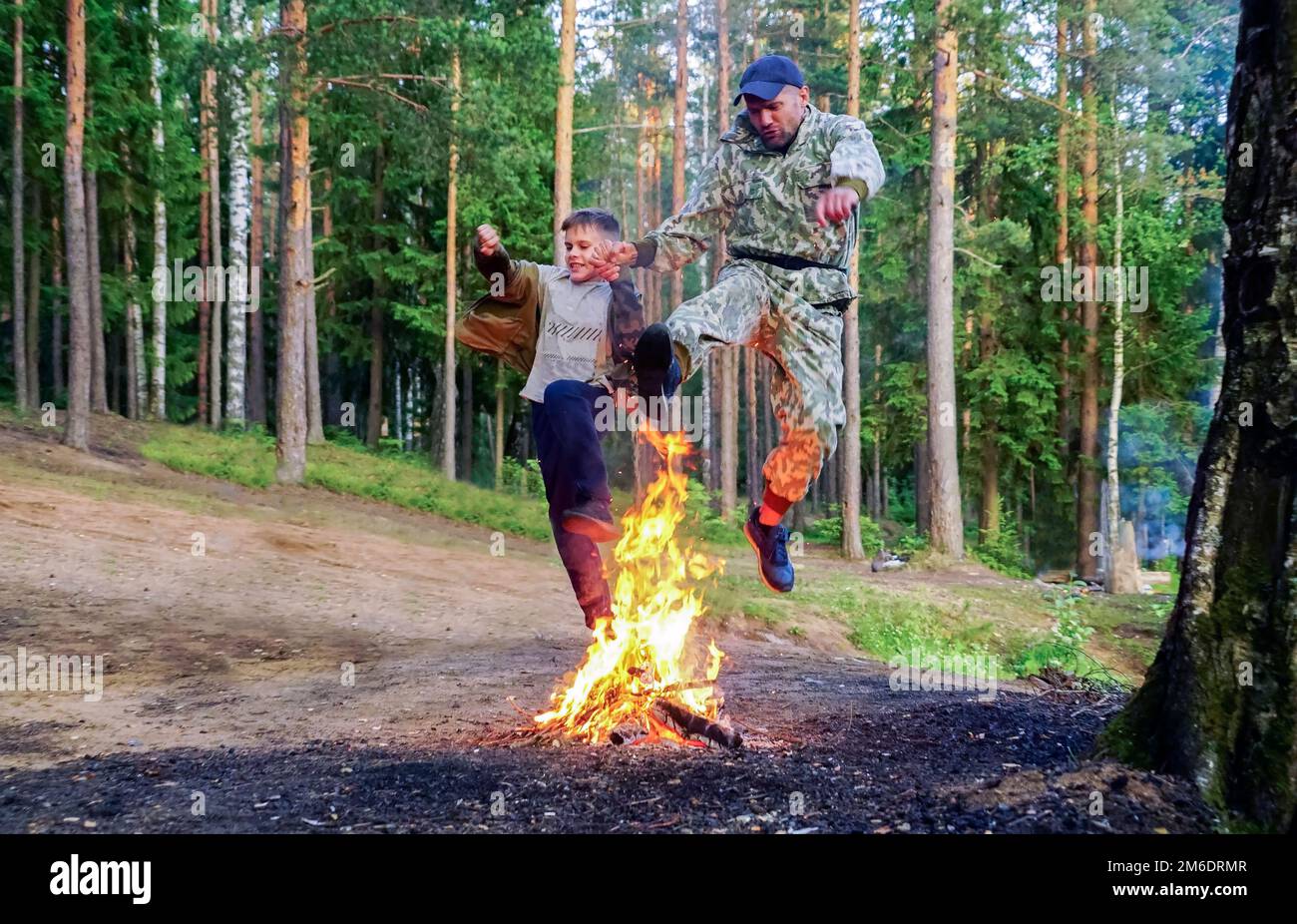 Jumping over fire hi-res stock photography and images - Alamy