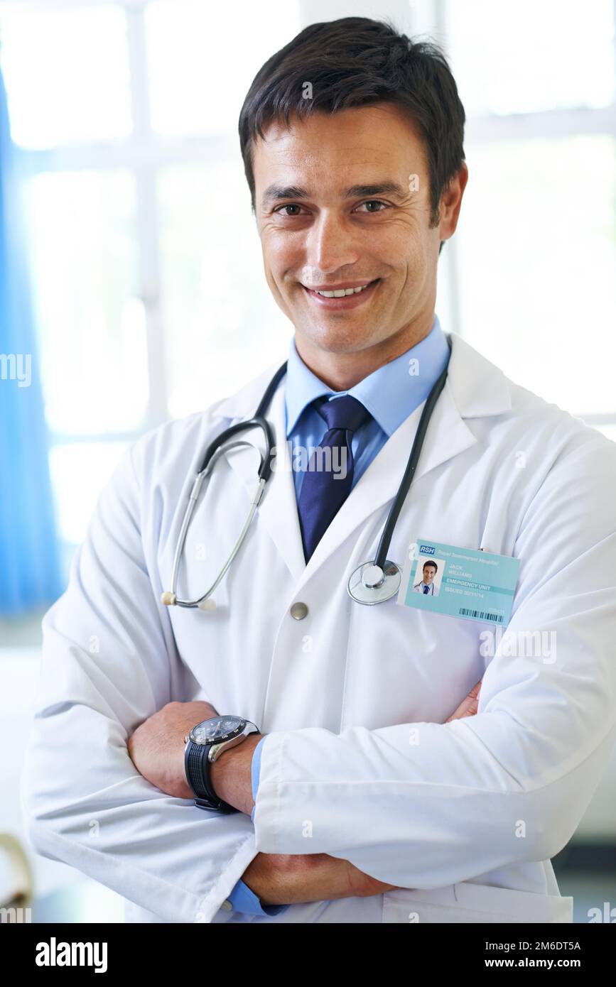 Youll be feeling better in no time. Portrait of a handsome young doctor ...