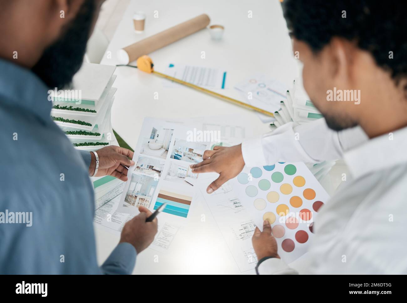 Architecture, interior design and planning with architect and men work ...