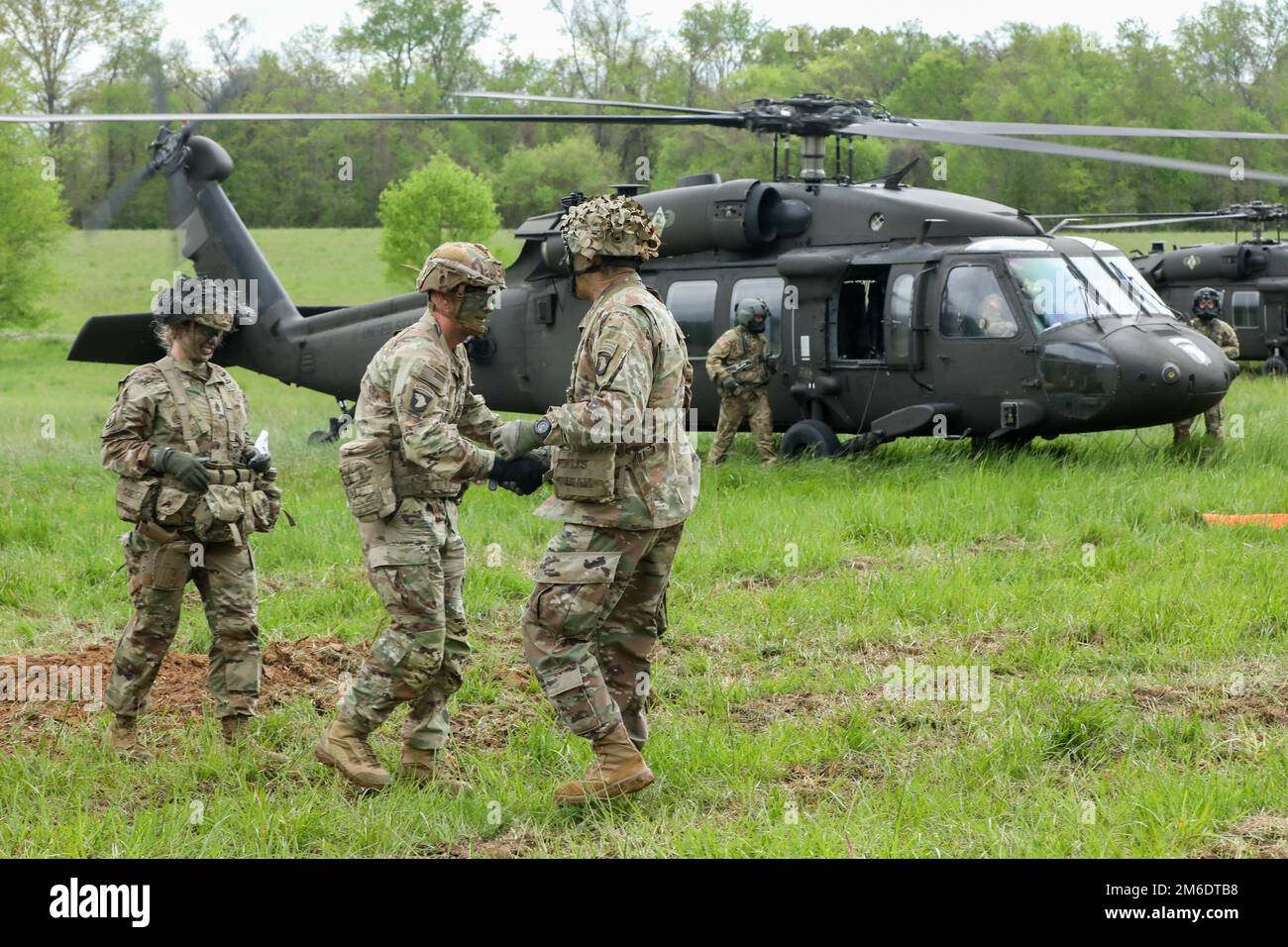 Forces Command (FORSCOM) Command Sgt. Maj. Todd Sims is greeted by Maj ...