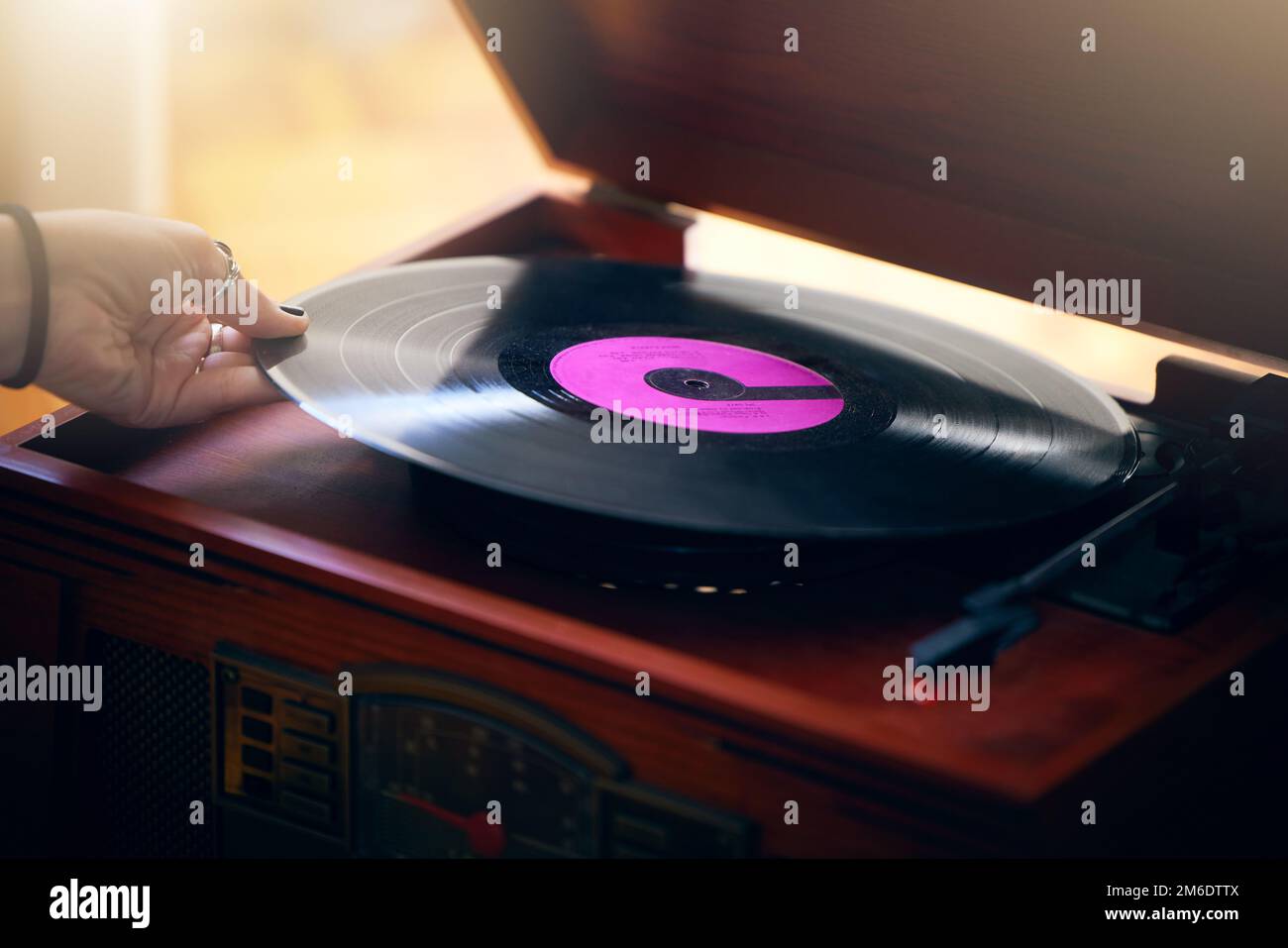 Female record record player hi-res stock photography and images - Alamy