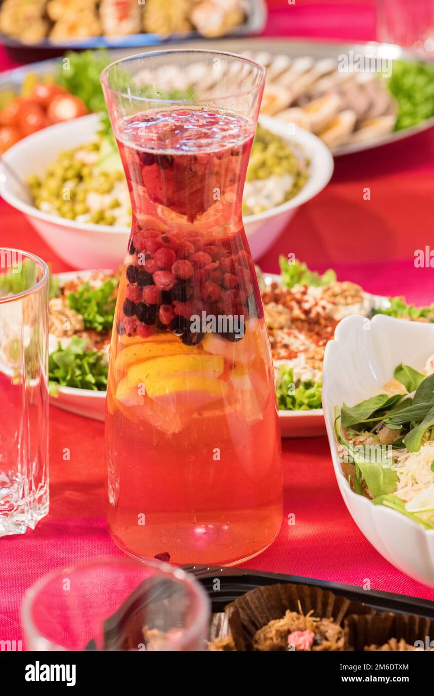 Served table with different dishes and drinks Stock Photo - Alamy