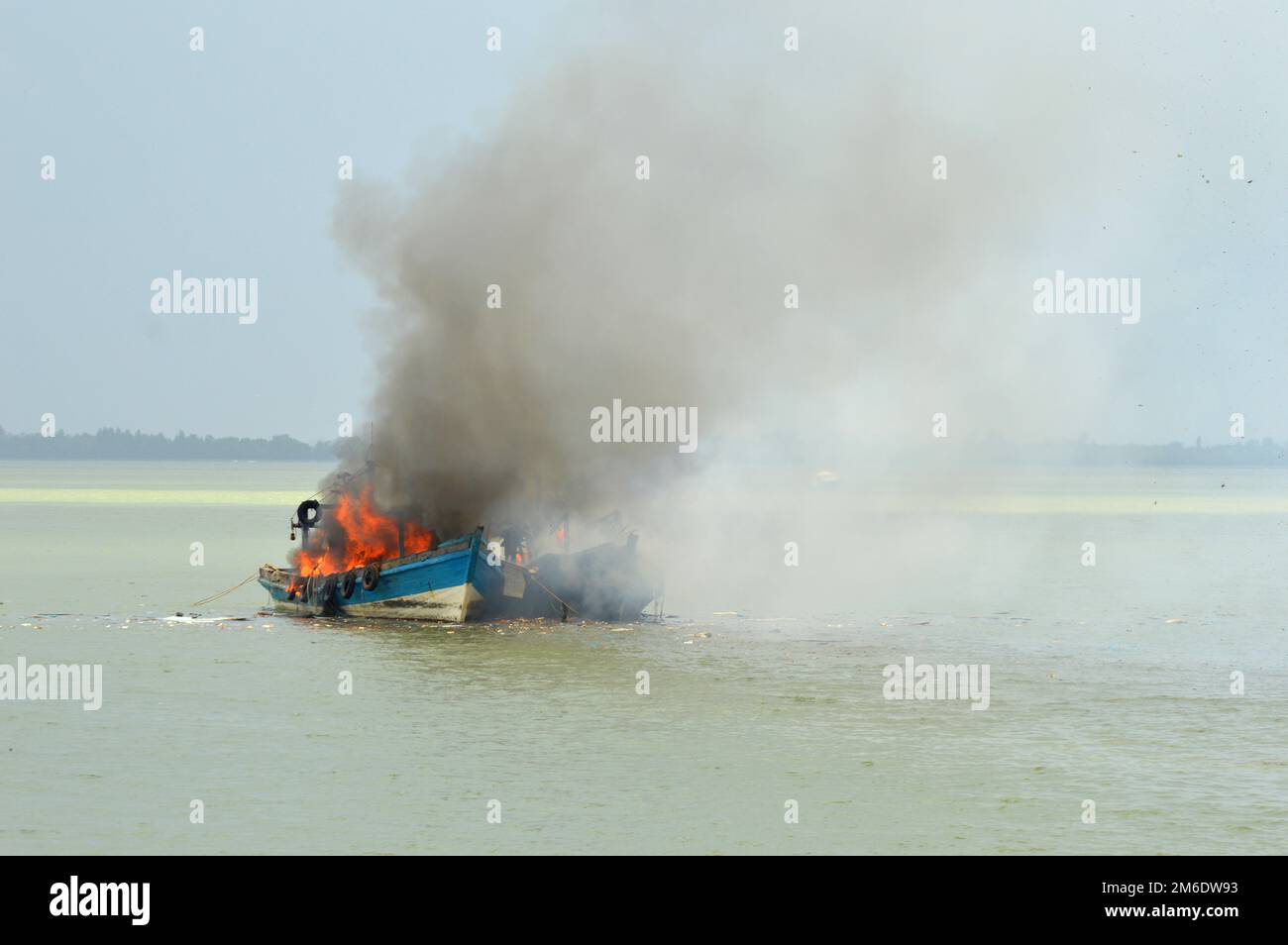 Explosions fishing boat Stock Photo - Alamy