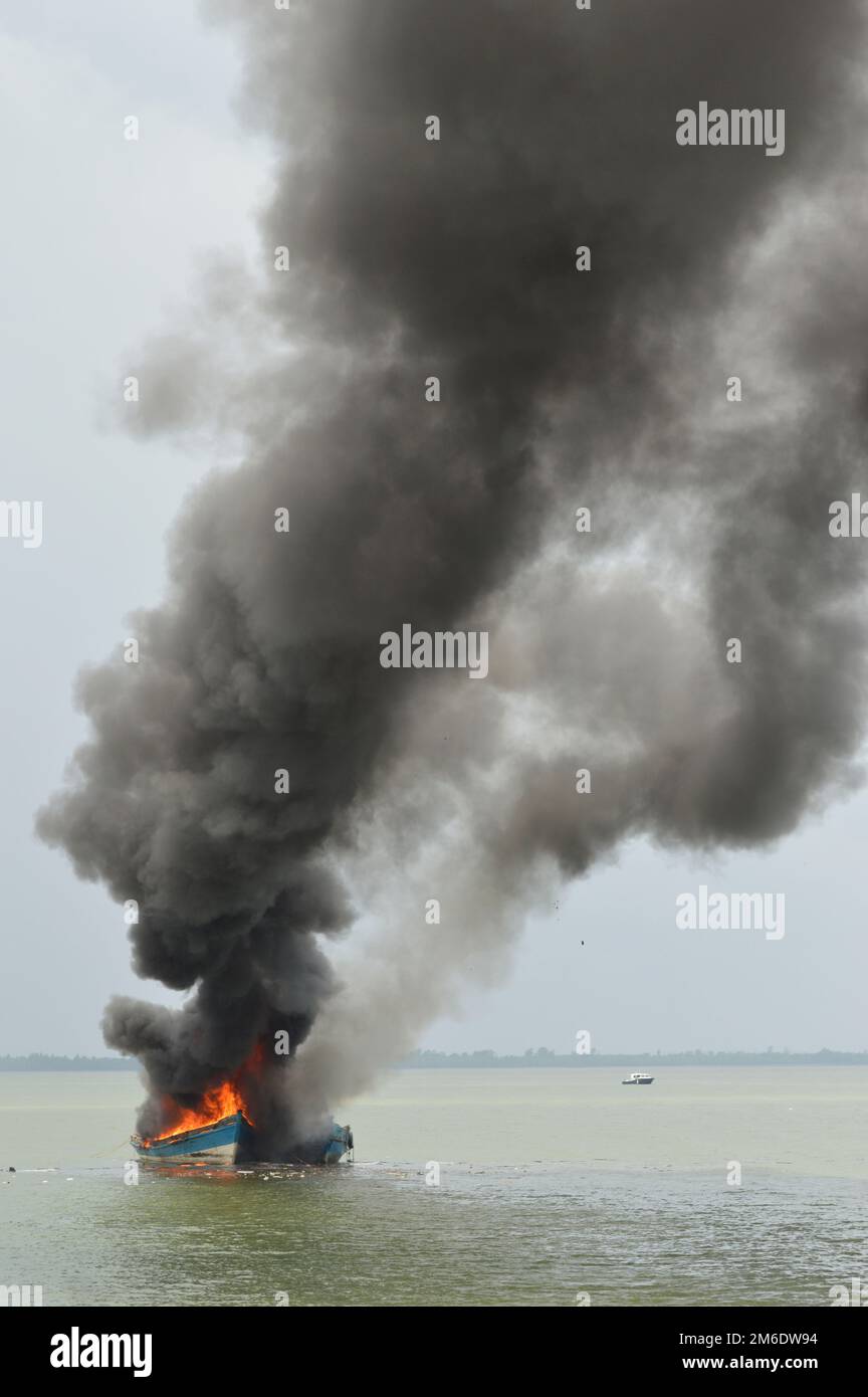 Explosions fishing boat Stock Photo - Alamy