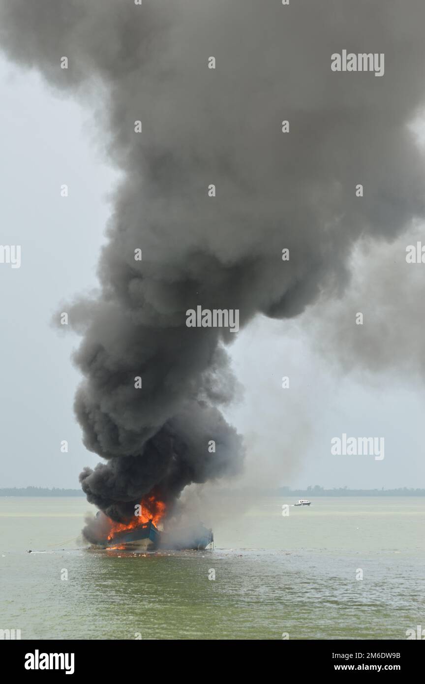 Explosions fishing boat Stock Photo - Alamy