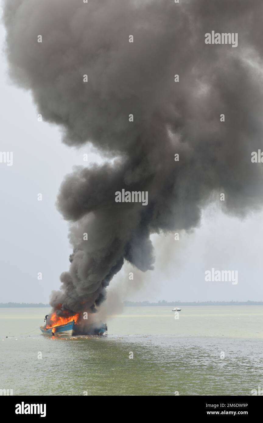 Explosions fishing boat Stock Photo - Alamy