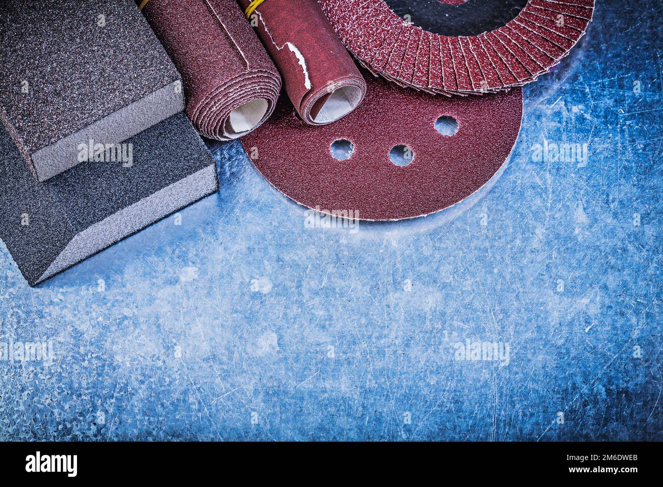 Collection of abrasive tools on scratched metallic background Stock ...