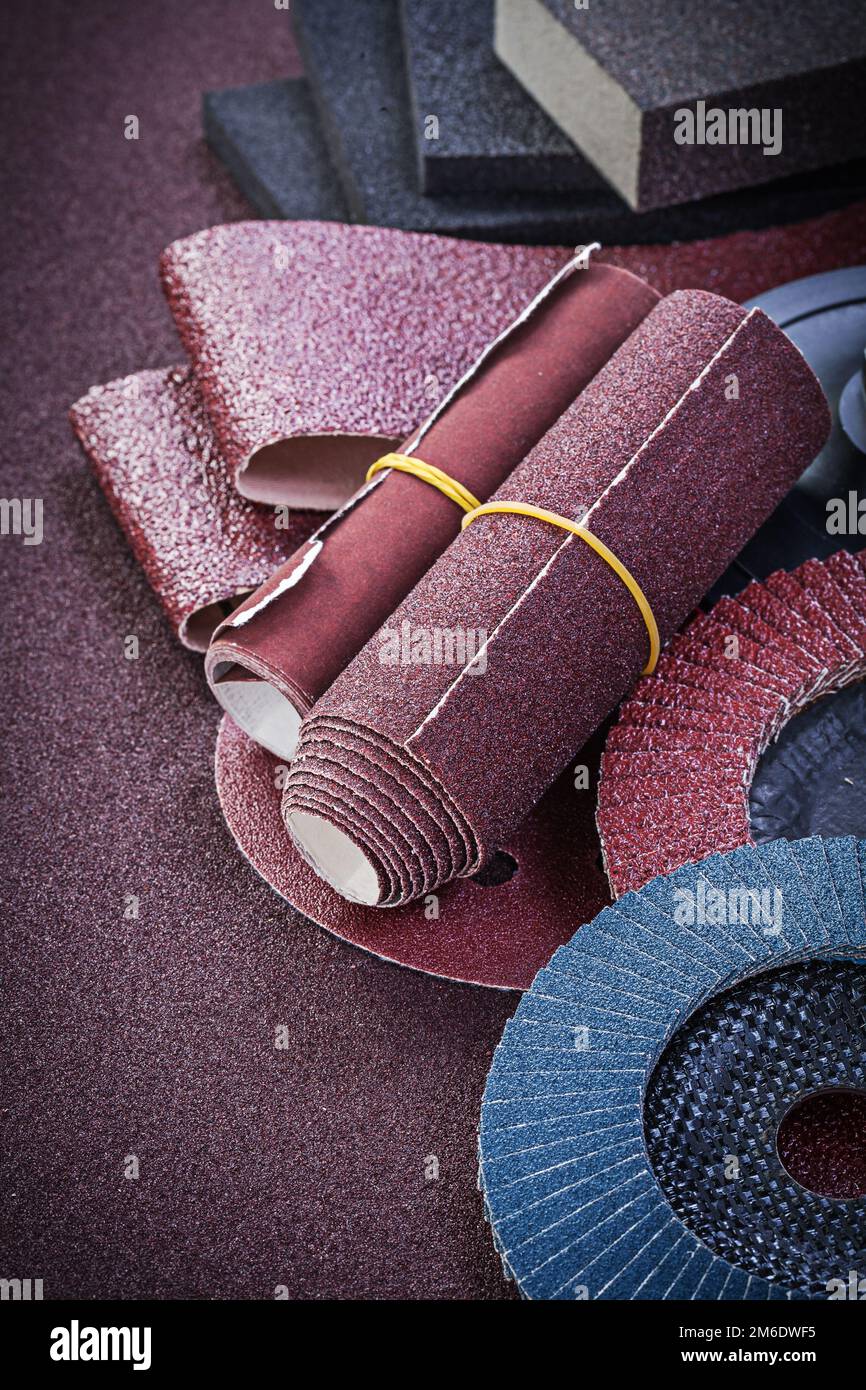 Collection of abrasive tools on sandpaper top view Stock Photo - Alamy
