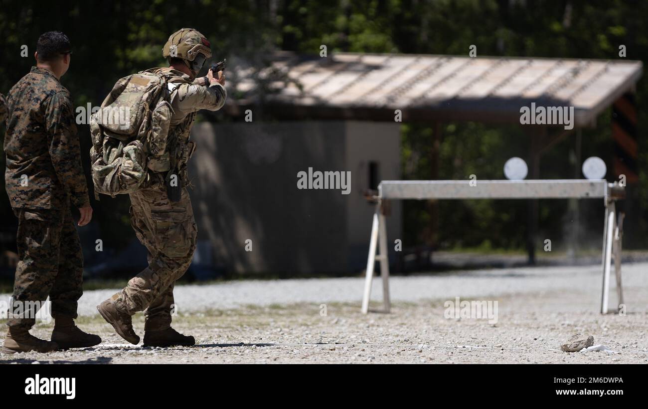 U.S. Army Sgt Ryan Bozell, an Army Sniper assigned to Headquarters ...