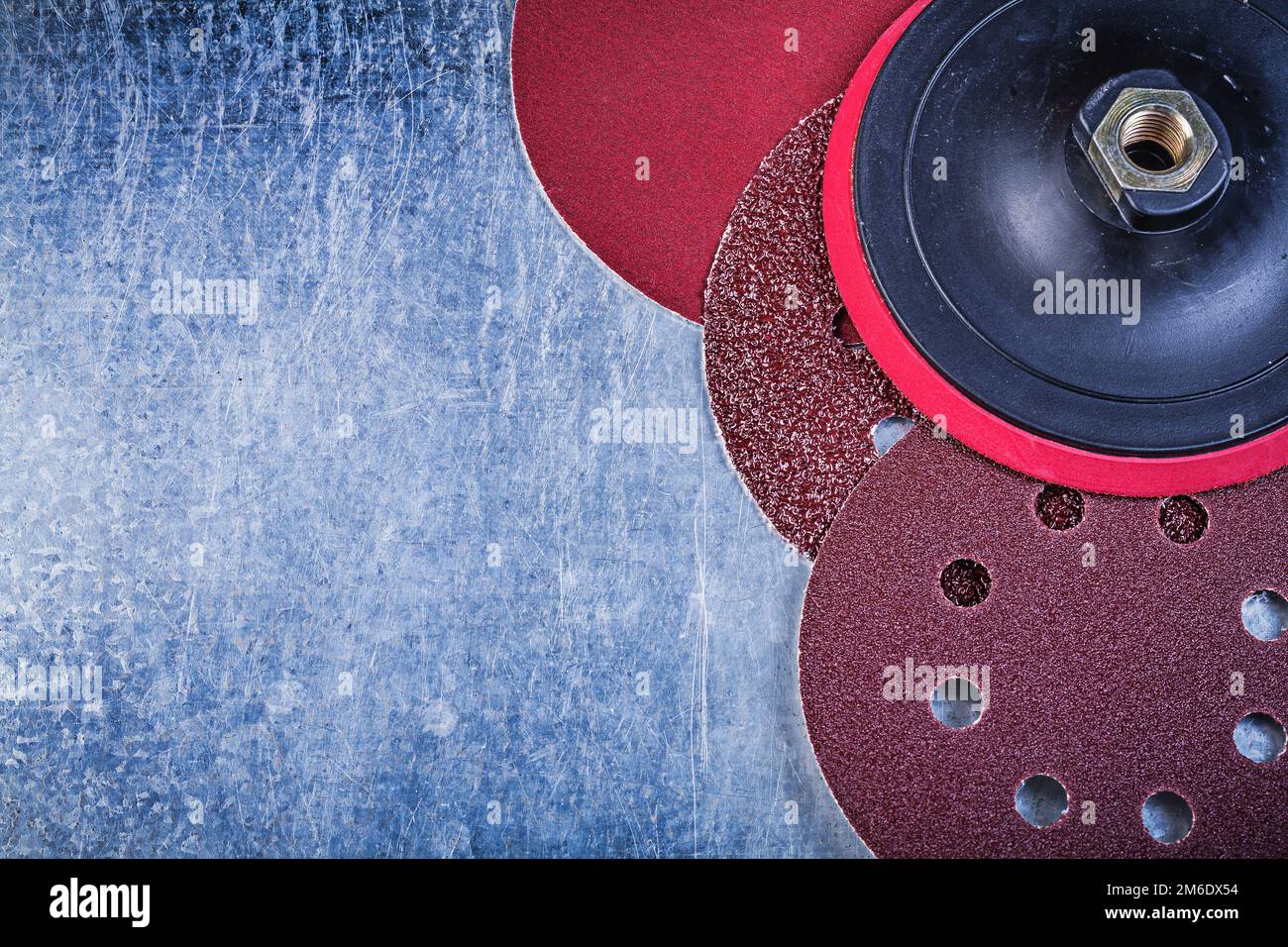 Grinding discs holder on metallic background abrasive materials Stock ...