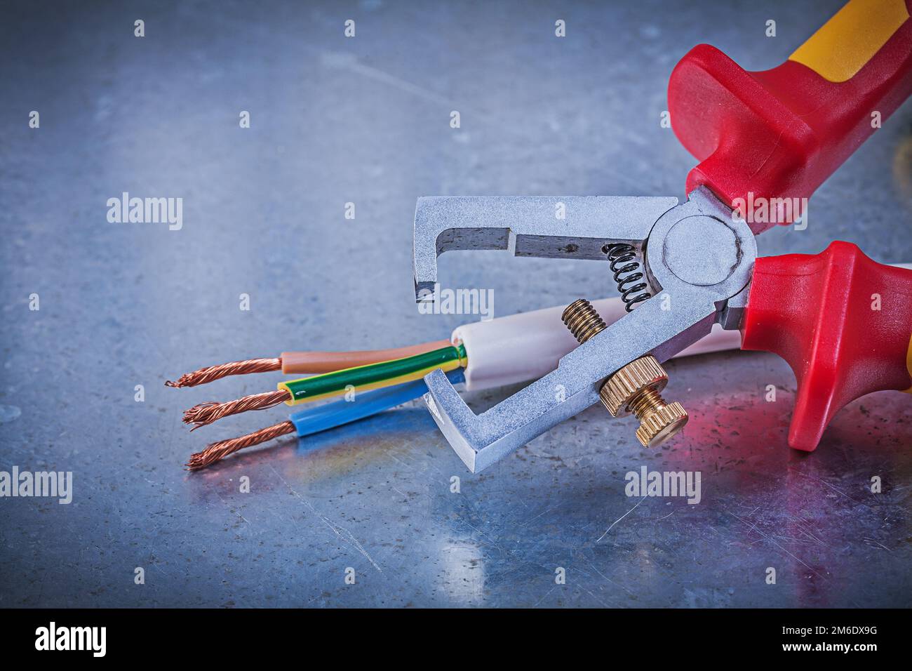 Insulation strippers electric wires on metallic background horizontal ...