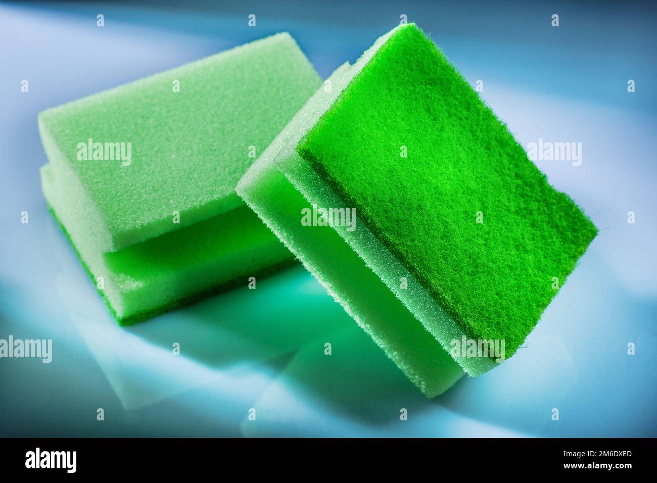 New green sponge on white background Stock Photo - Alamy