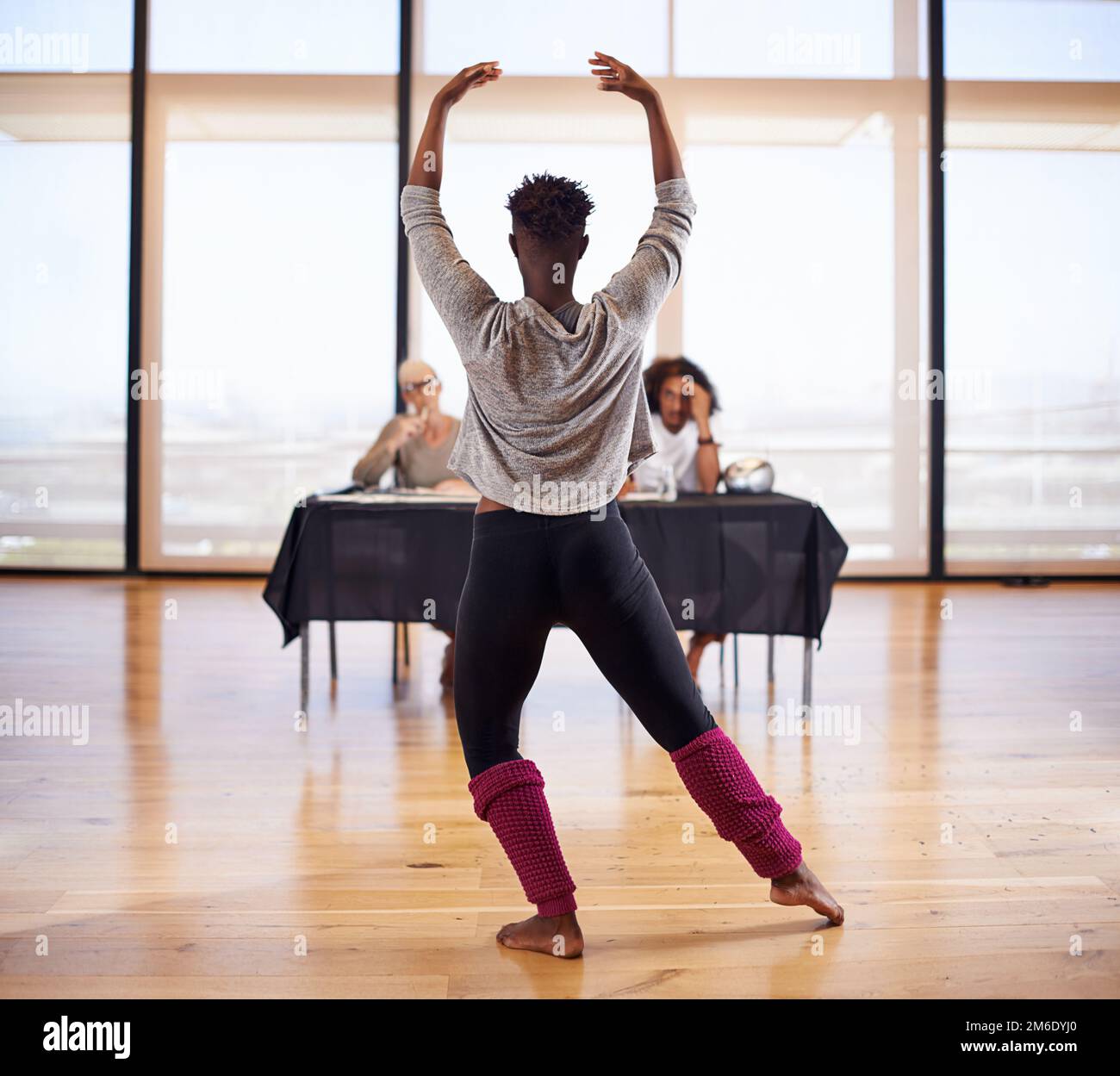 Shes in it to win it. Rearview shot of a female dancer performing ...