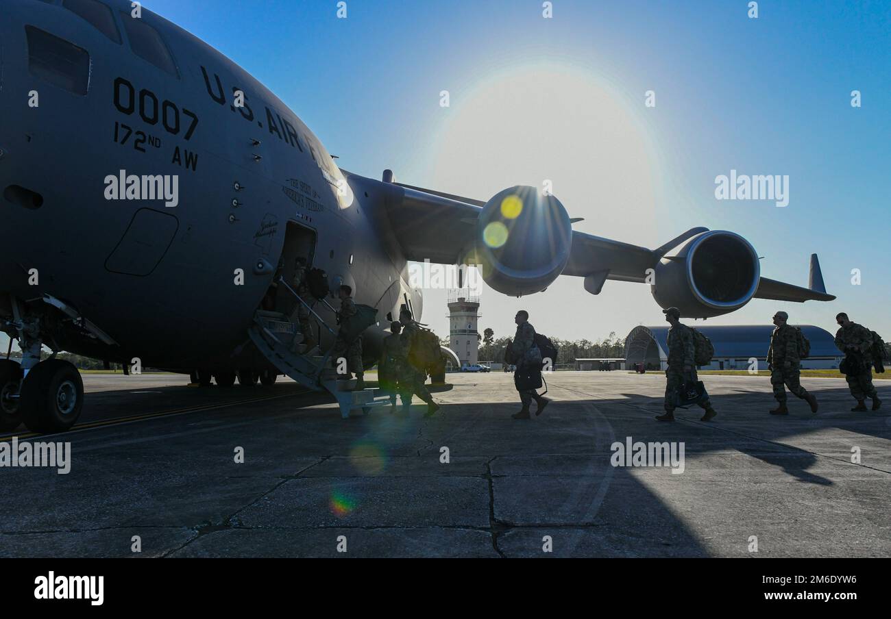 Airmen assigned to the 248th Air Traffic Controller Squadron board a C ...