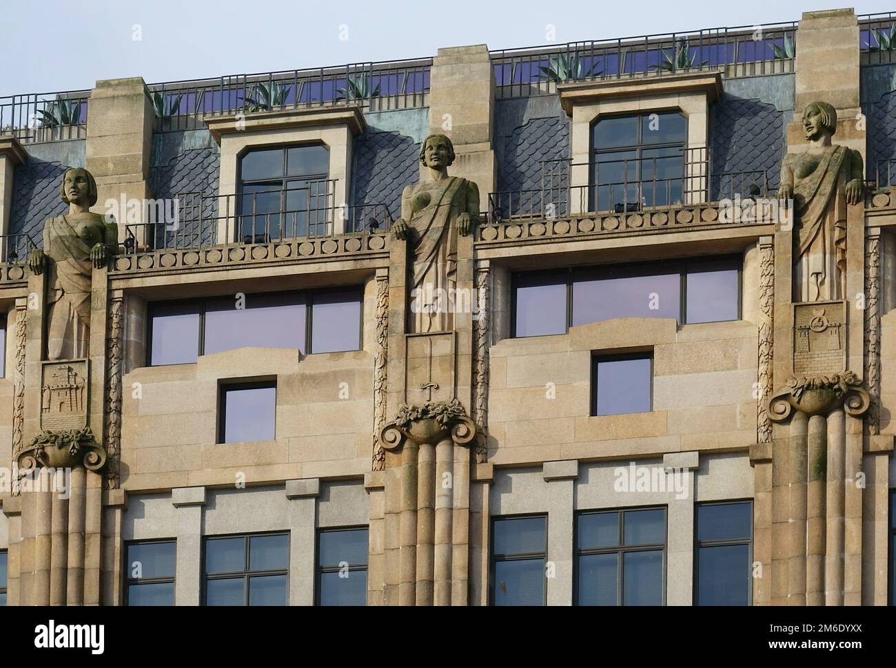 Autumn day and a fragment of the artistic facade of a building in the ...