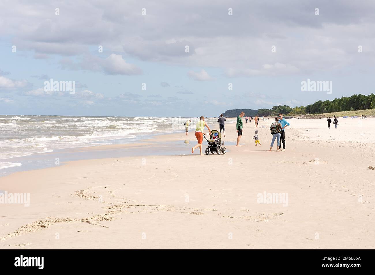 Tourist on the beach in Karwia (Poland Stock Photo - Alamy