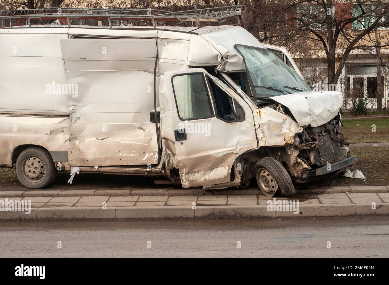 Crushed in car accident transport van Stock Photo - Alamy
