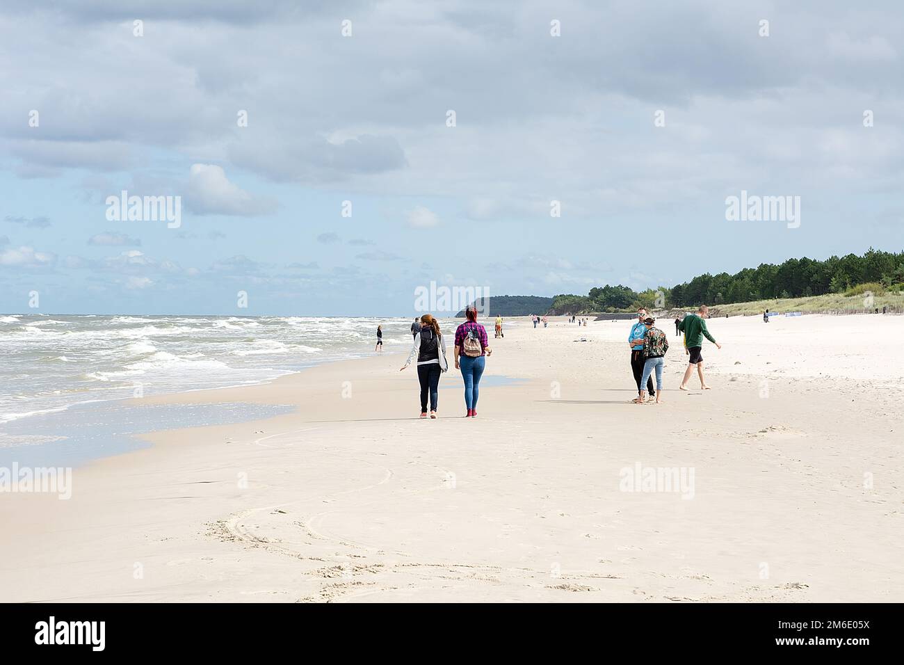 Tourist on the beach in Karwia (Poland Stock Photo - Alamy