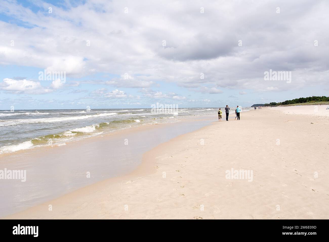 Tourist on the beach in Karwia (Poland Stock Photo - Alamy
