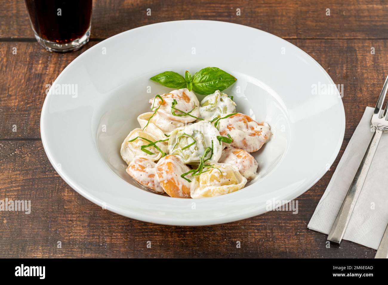 different types of pelmeni or russian dumplings in white plate on ...