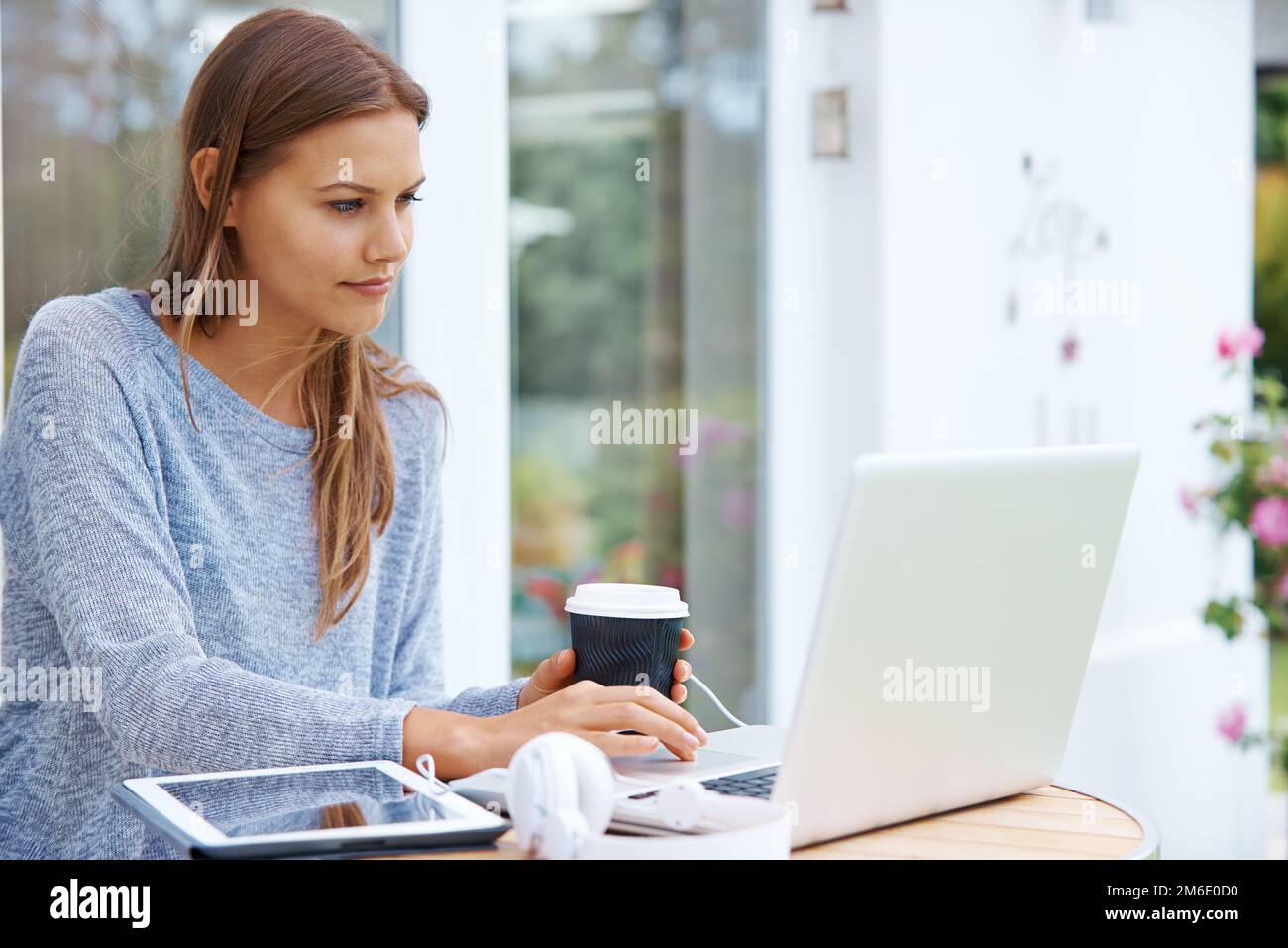 The office is whatever you make it. an attractive young woman working ...