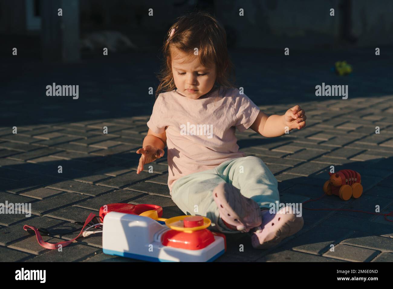 Children playing with educational toys, learning through experience ...