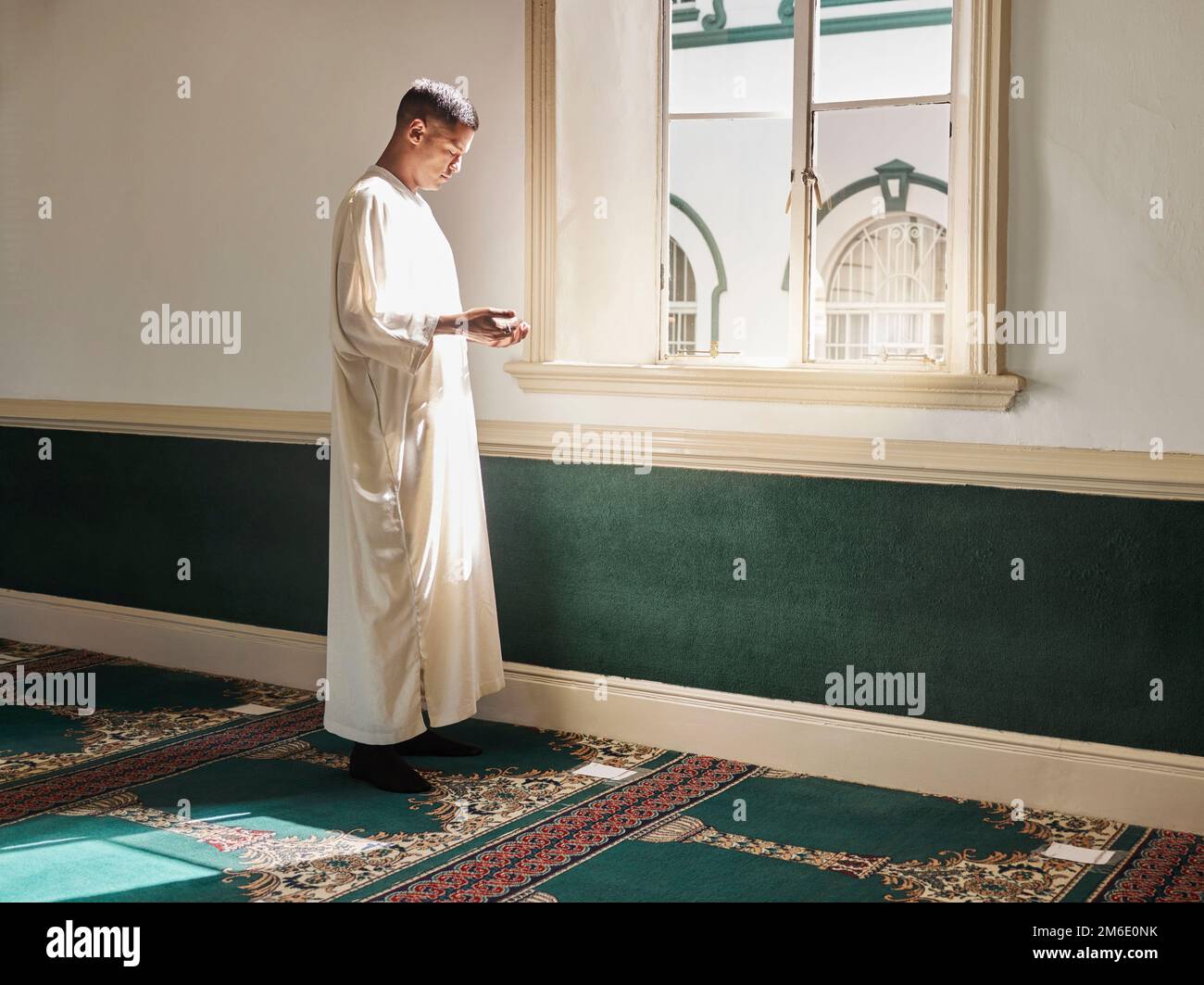 Muslim, prayer or man in a mosque praying to Allah for spiritual ...