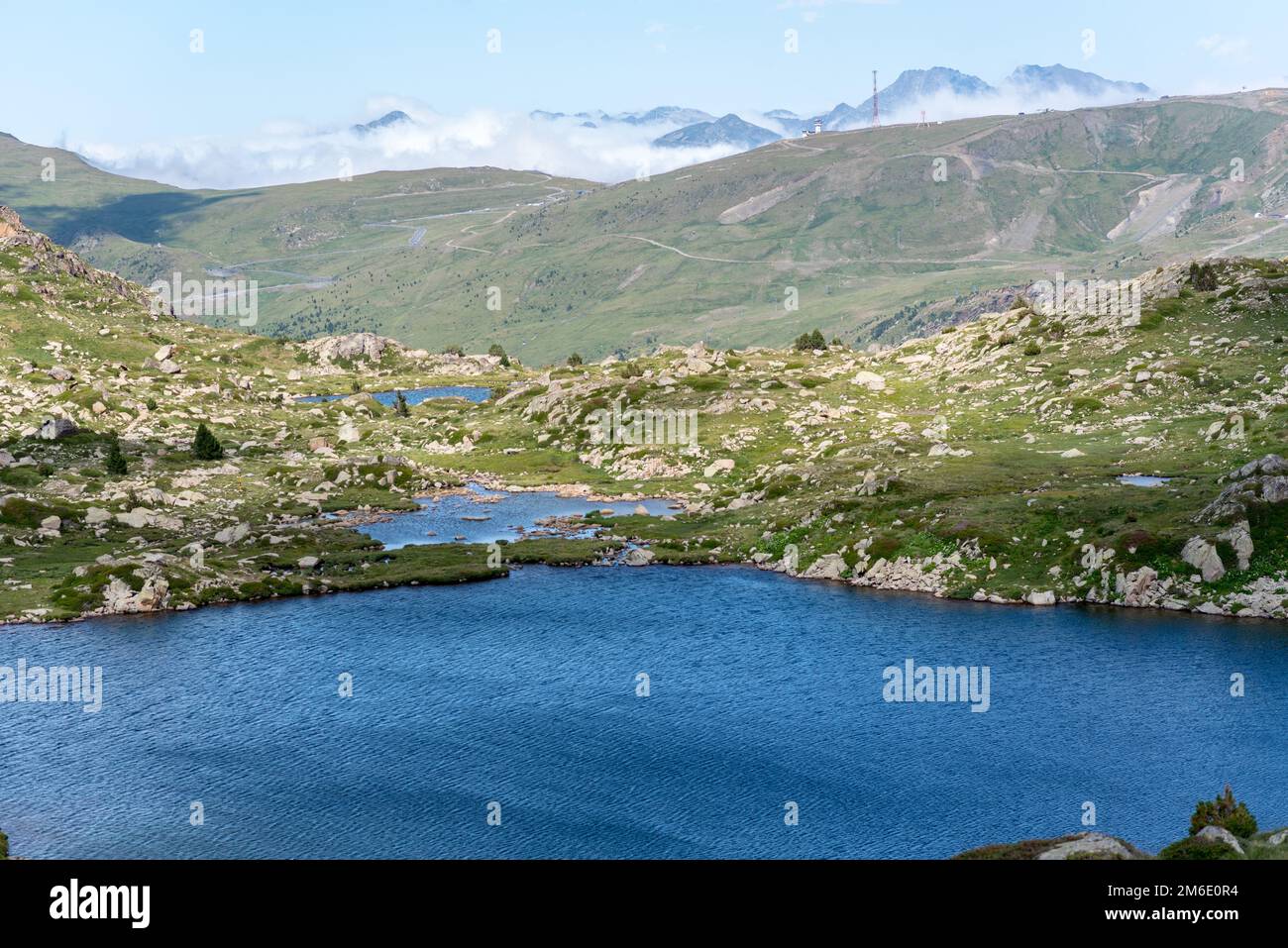 Reflection at the lake in the circuit of Lake Pessons, Andorra Stock ...