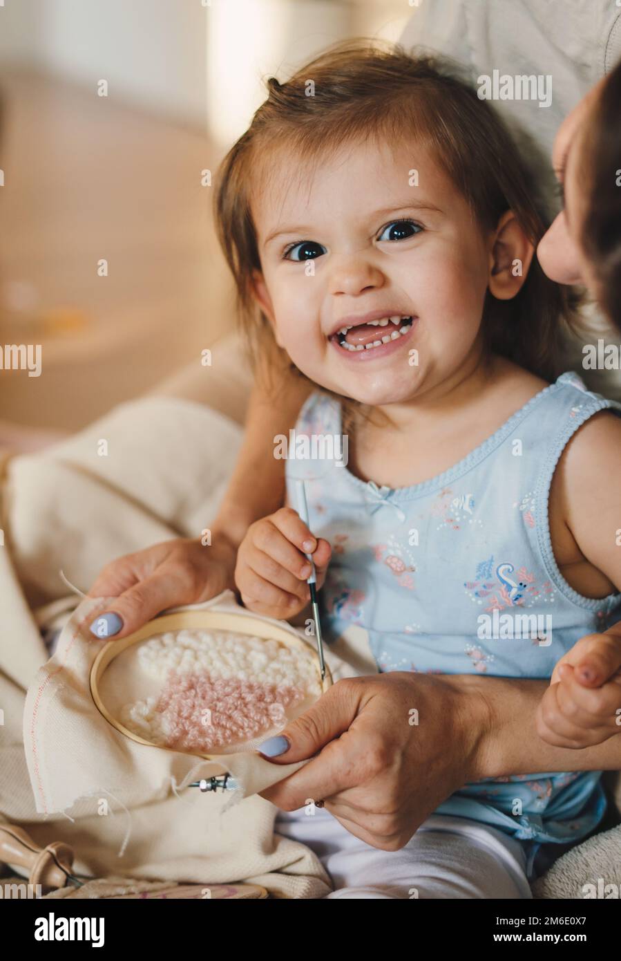 Girl stitching hi-res stock photography and images - Alamy