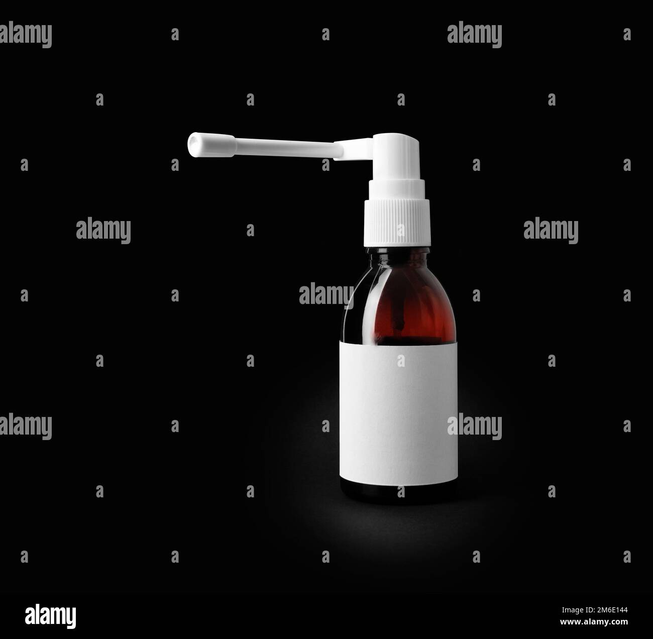 Throast spray medicine isolated on black background Stock Photo - Alamy