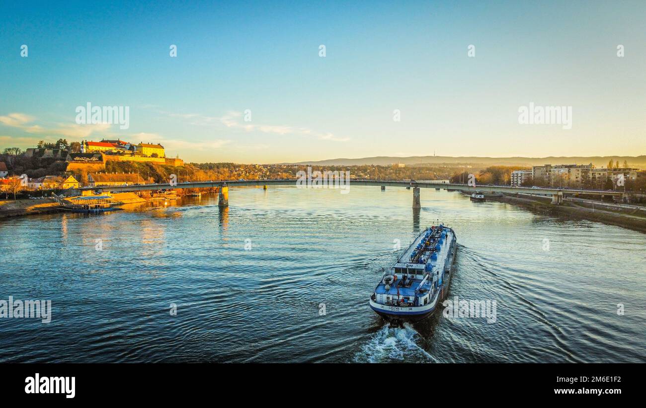 A landscape of a tour boat in Danube river near Pont de zezelj Tied ...