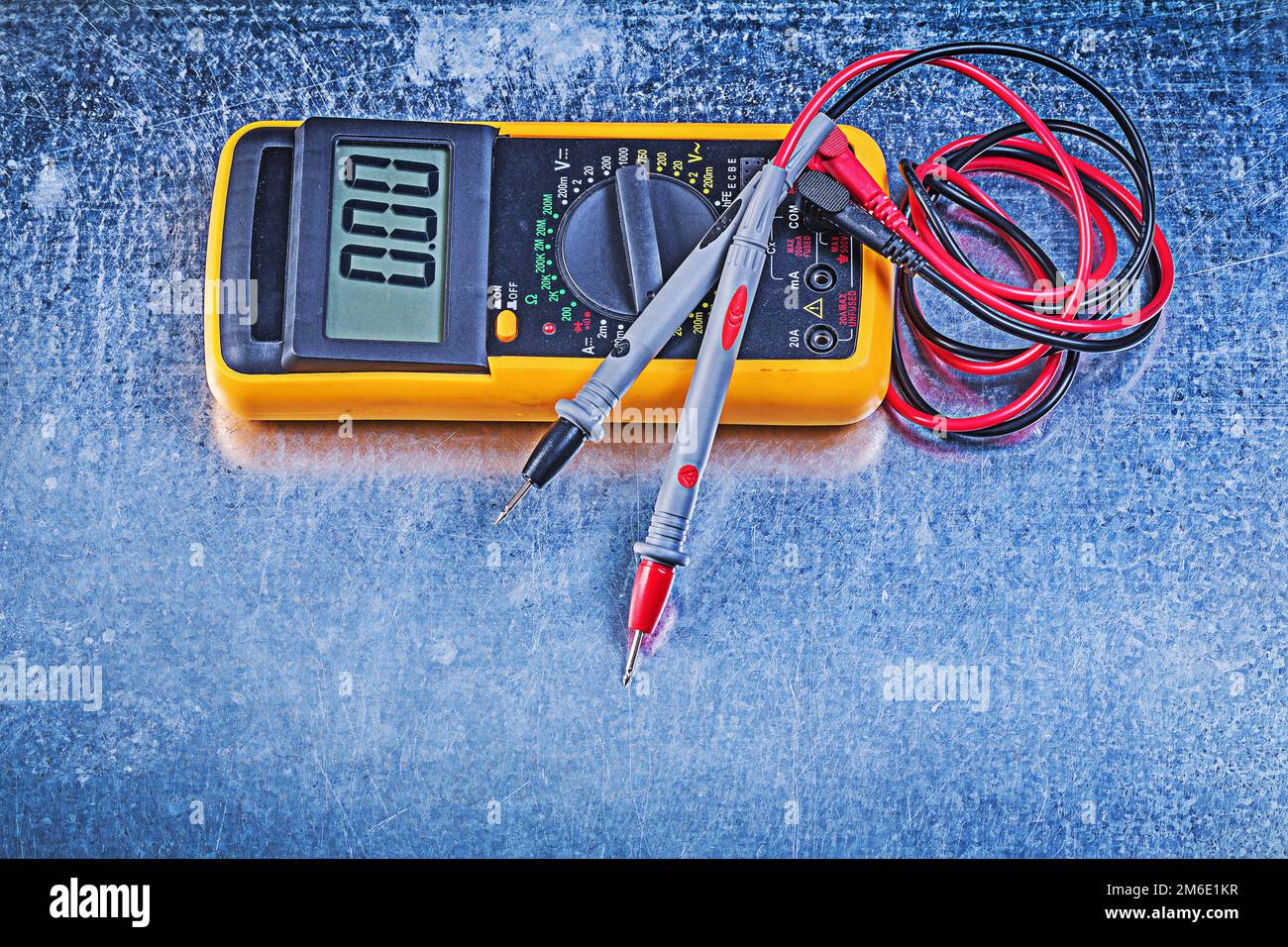 Digital electrical tester test leads on metallic background Stock Photo ...