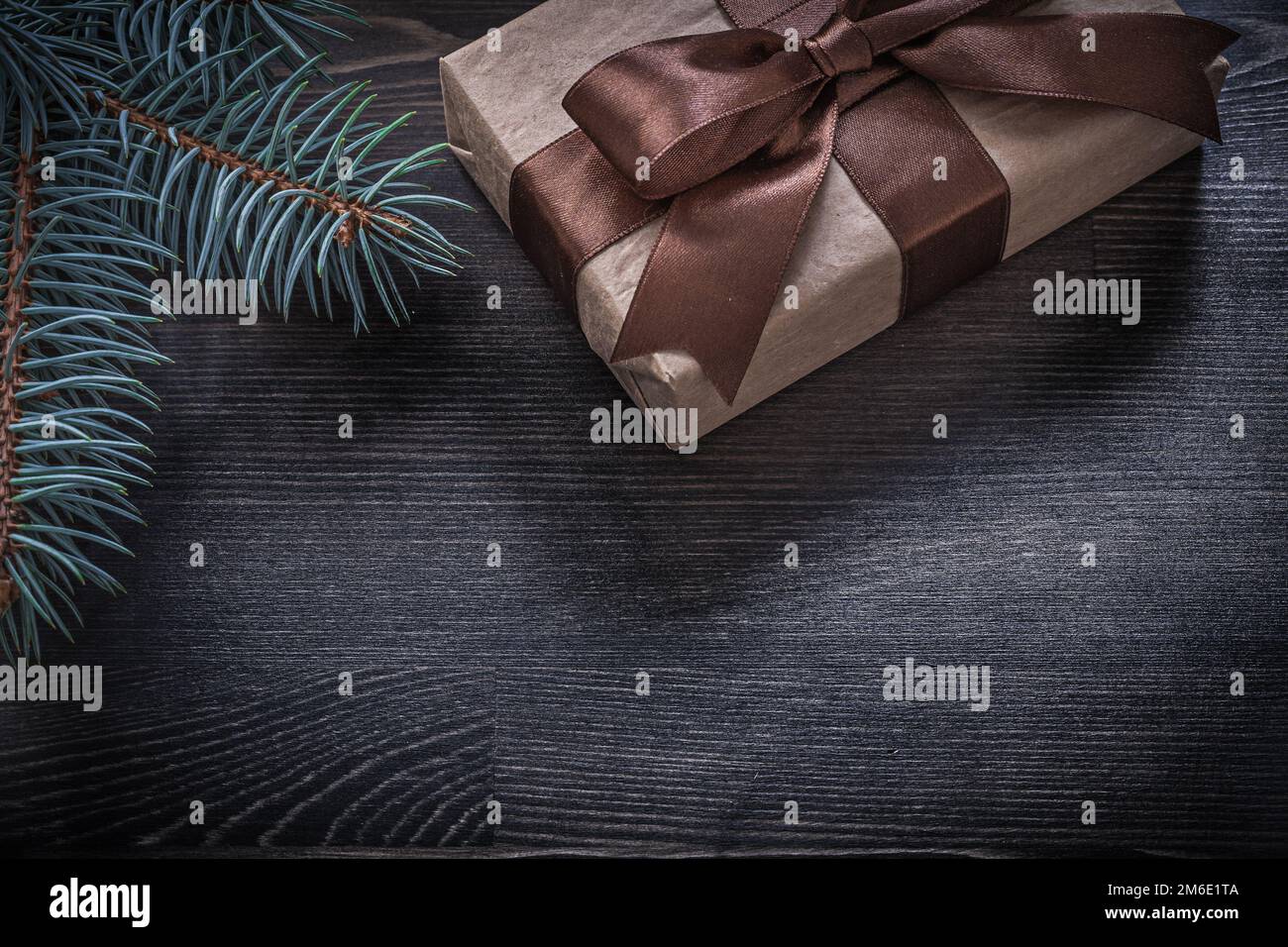 Evergreen tree present box on wooden board holiday concept Stock Photo ...