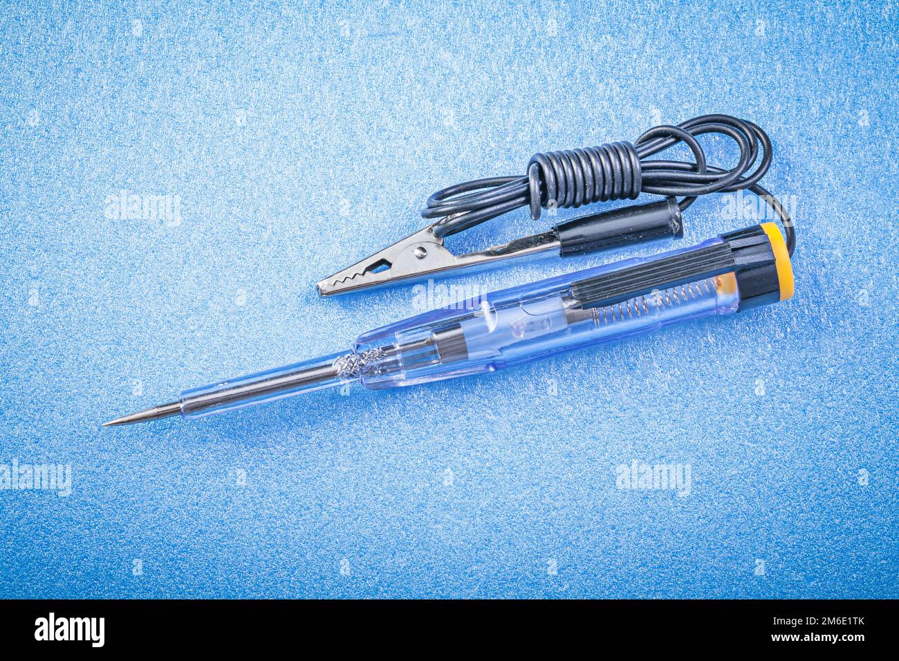 Electrical testers on blue background horizontal view electricity ...