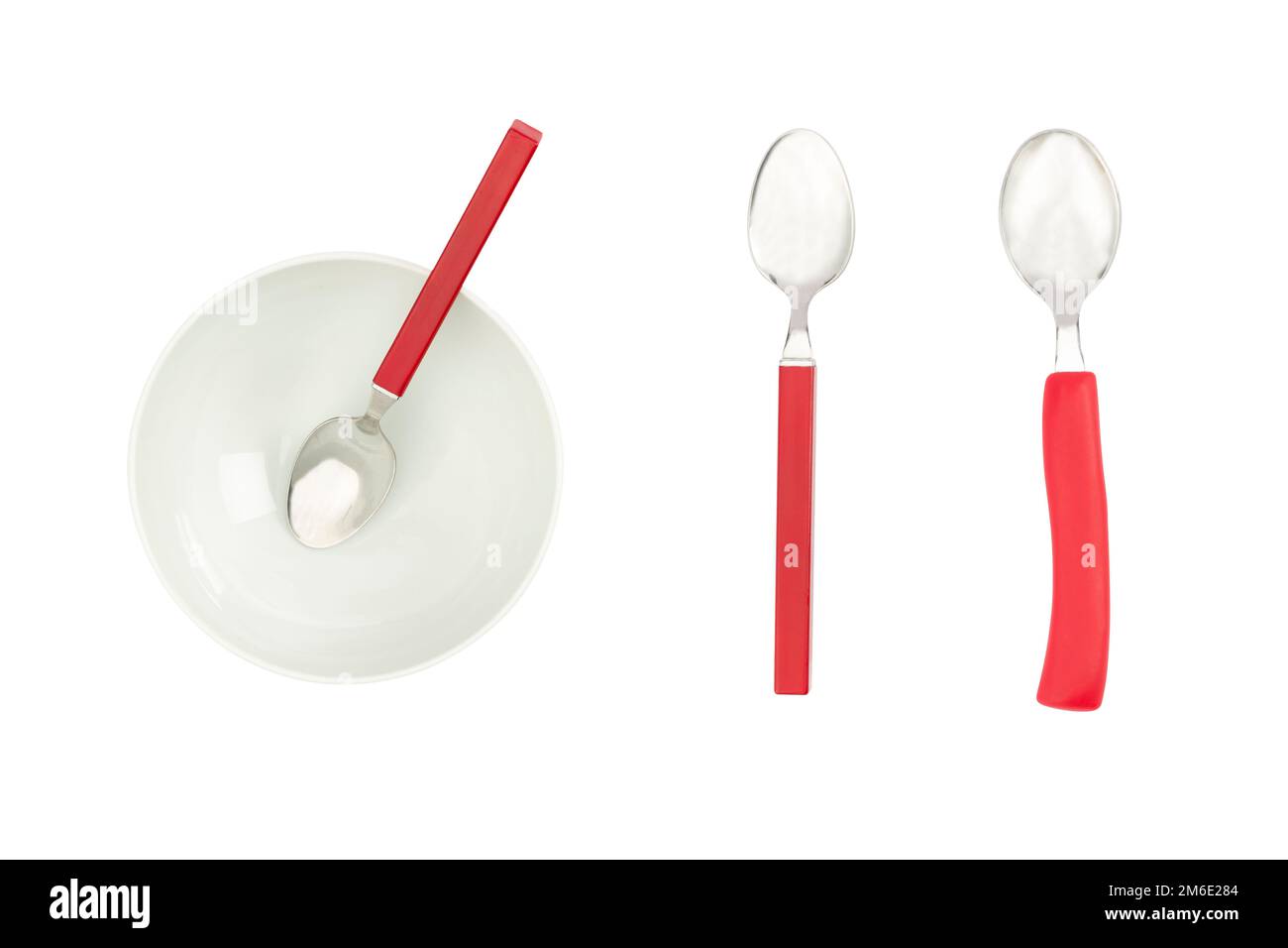 children's spoons and bowl on a white background Stock Photo - Alamy