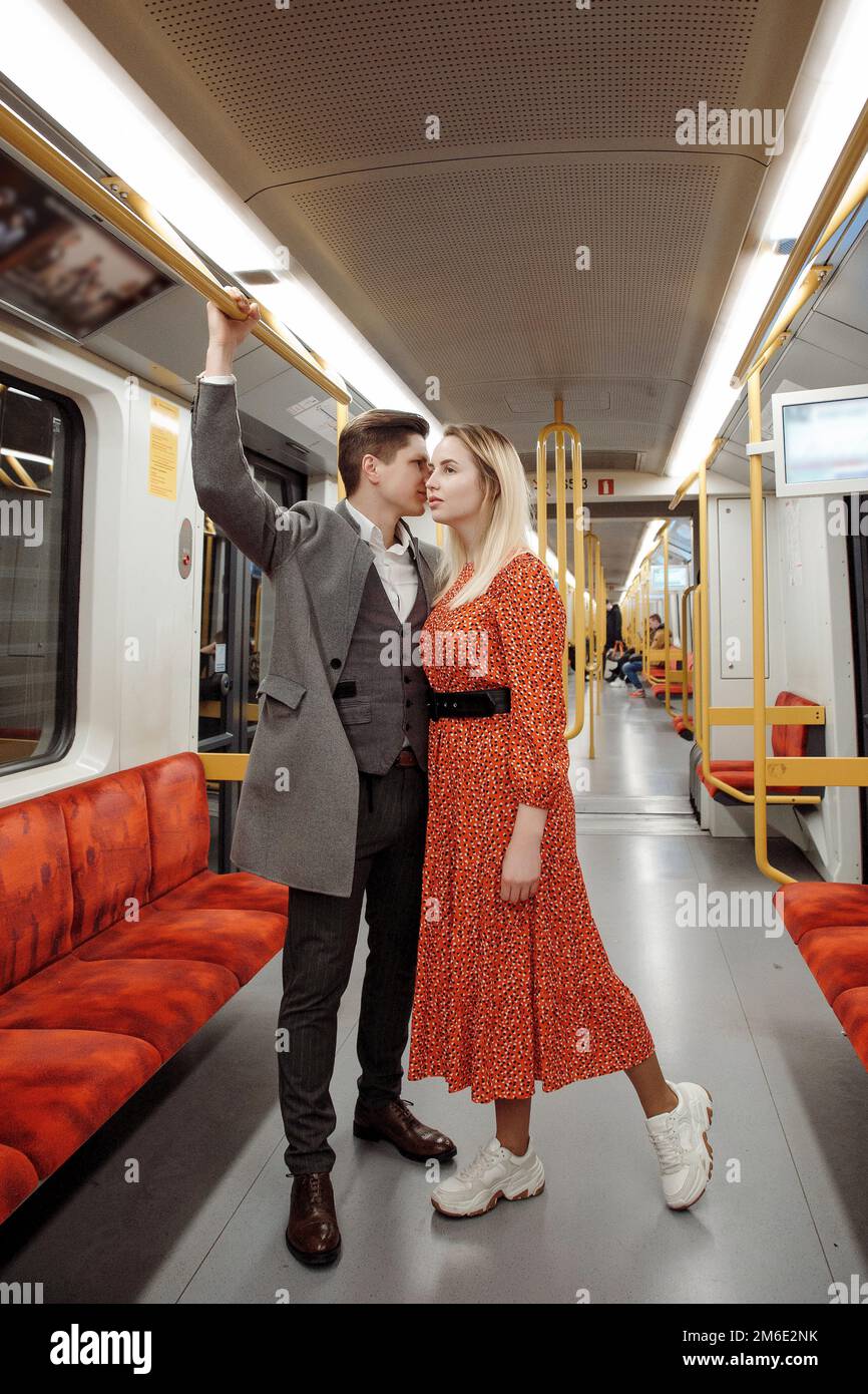 Young romantic couple in subway. Underground love story Stock Photo - Alamy