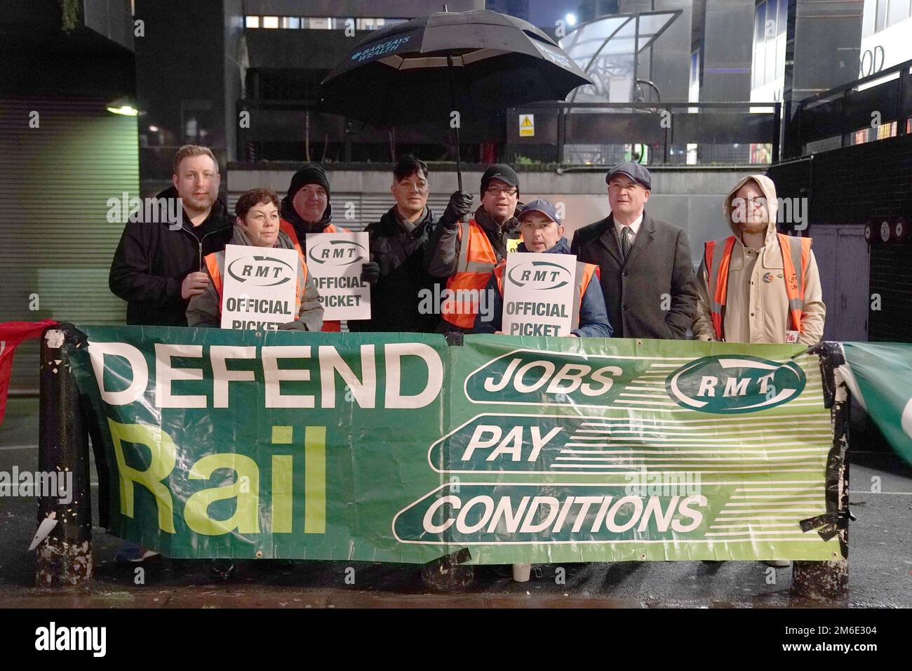 Mick Lynch (second right), general secretary of the Rail, Maritime and ...