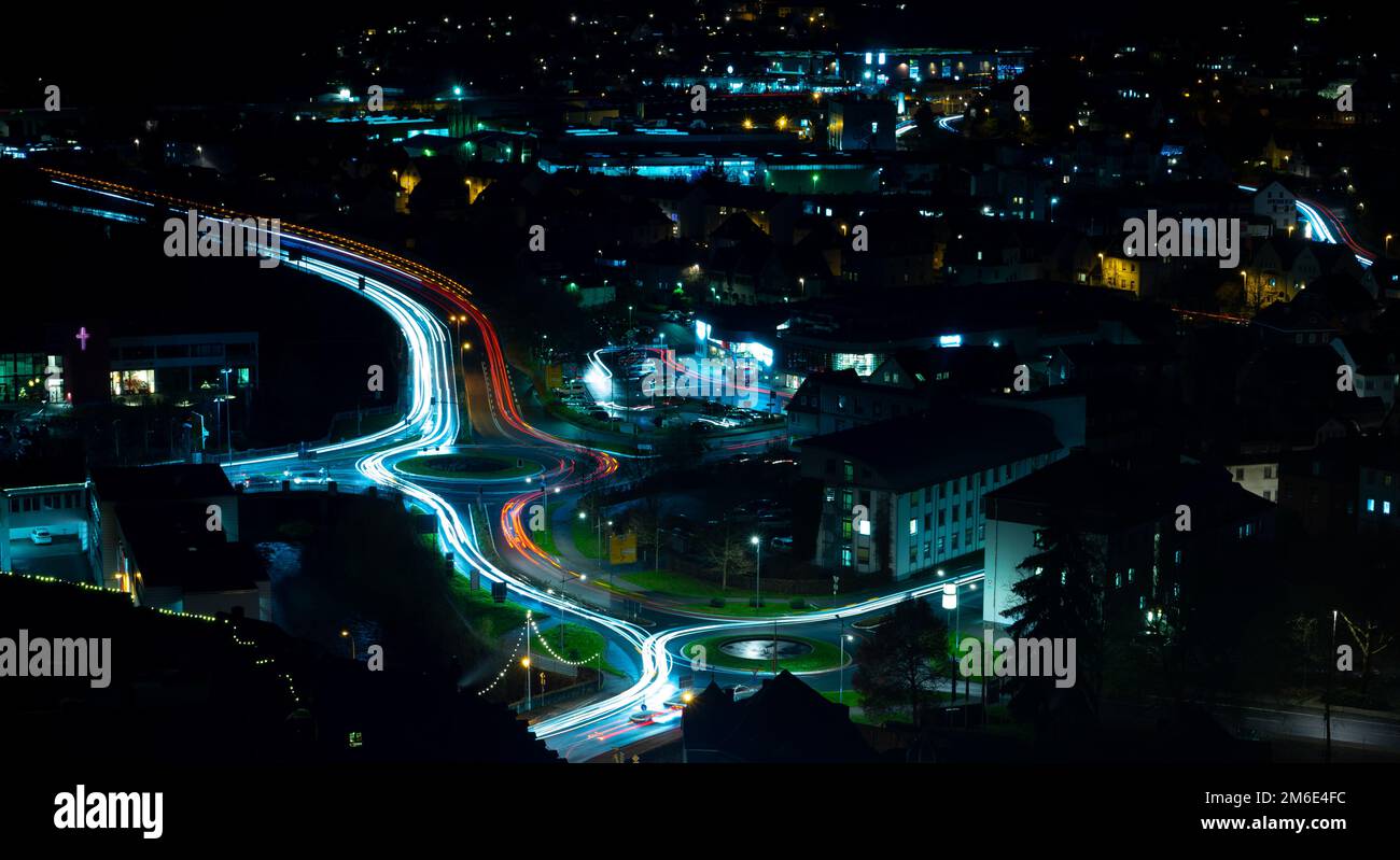 View of a roundabout traffic by night Stock Photo - Alamy