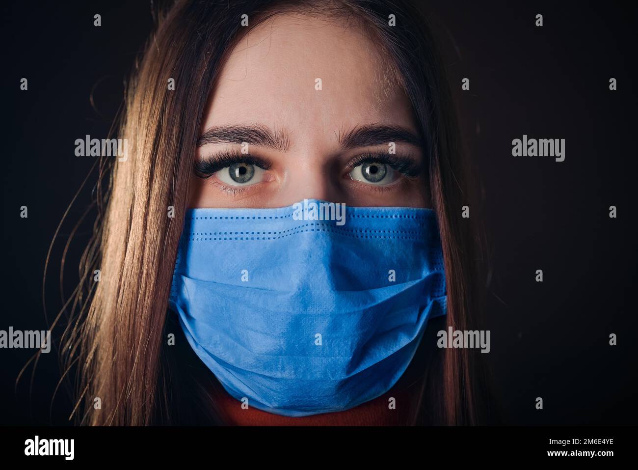 Flu cold or allergy symptom. Sick young woman sneezing in mask isolate ...