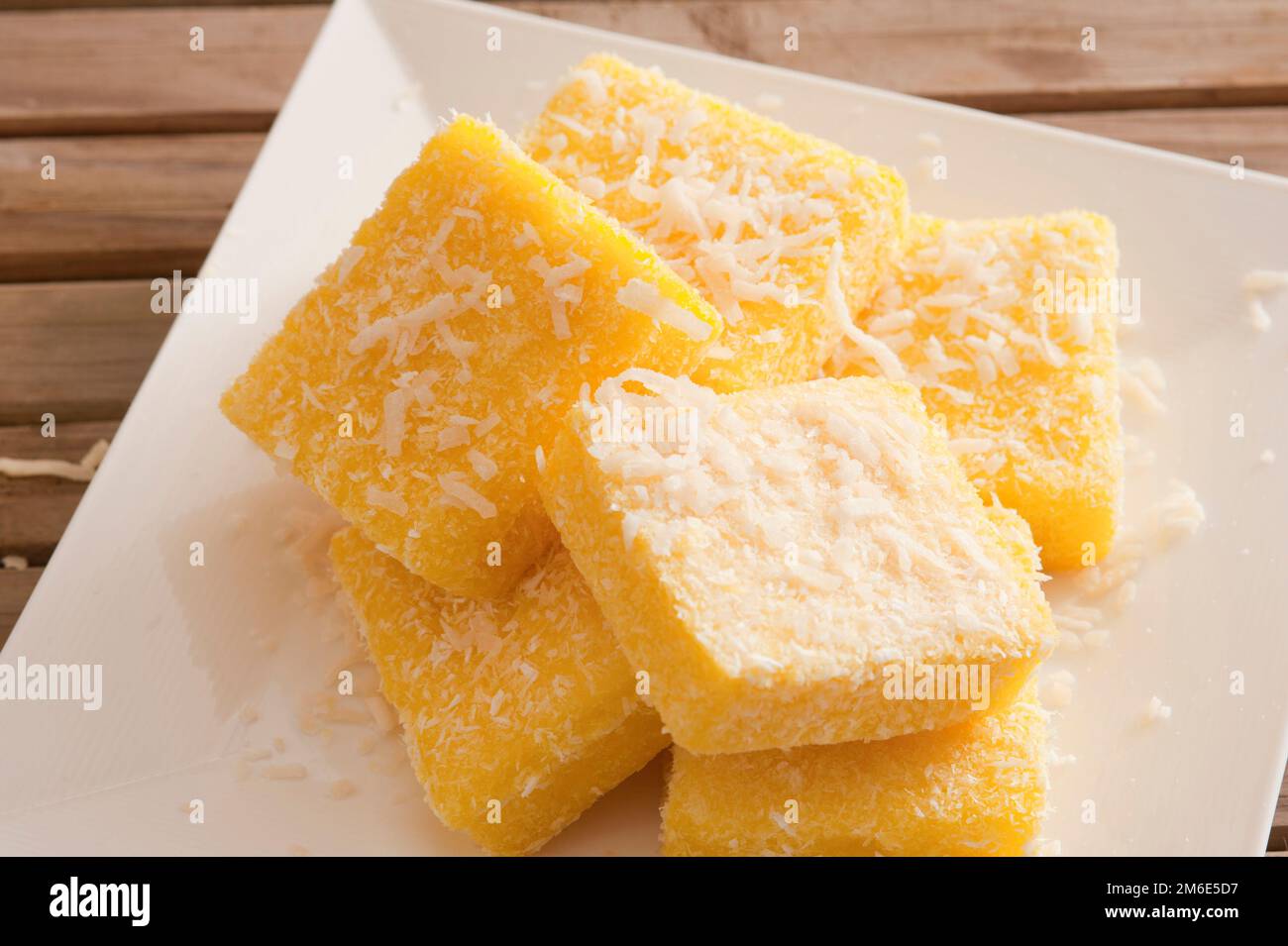 Plate with tasty lemon lamingtons Stock Photo - Alamy