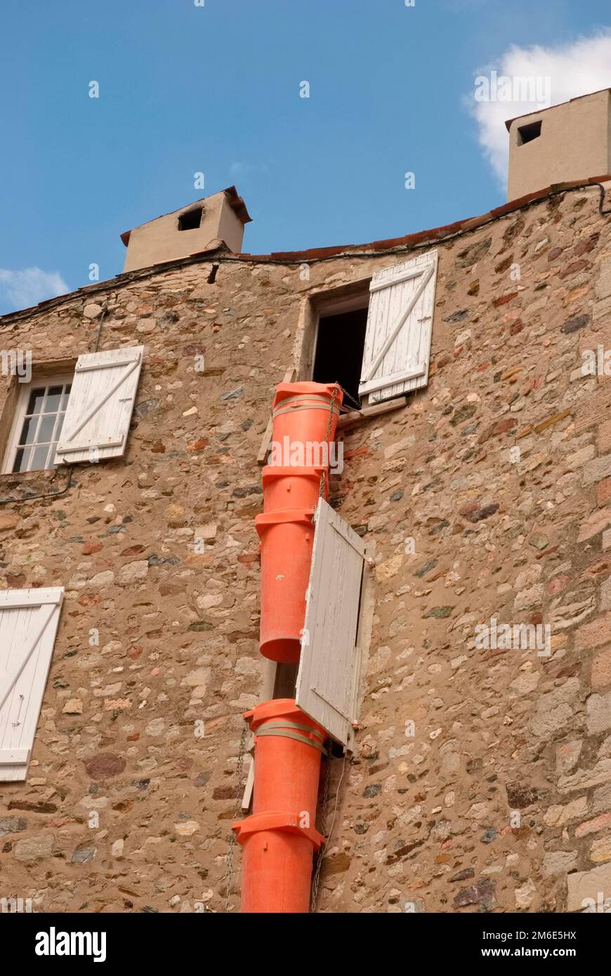 Renovation and waste removal through a window Stock Photo - Alamy