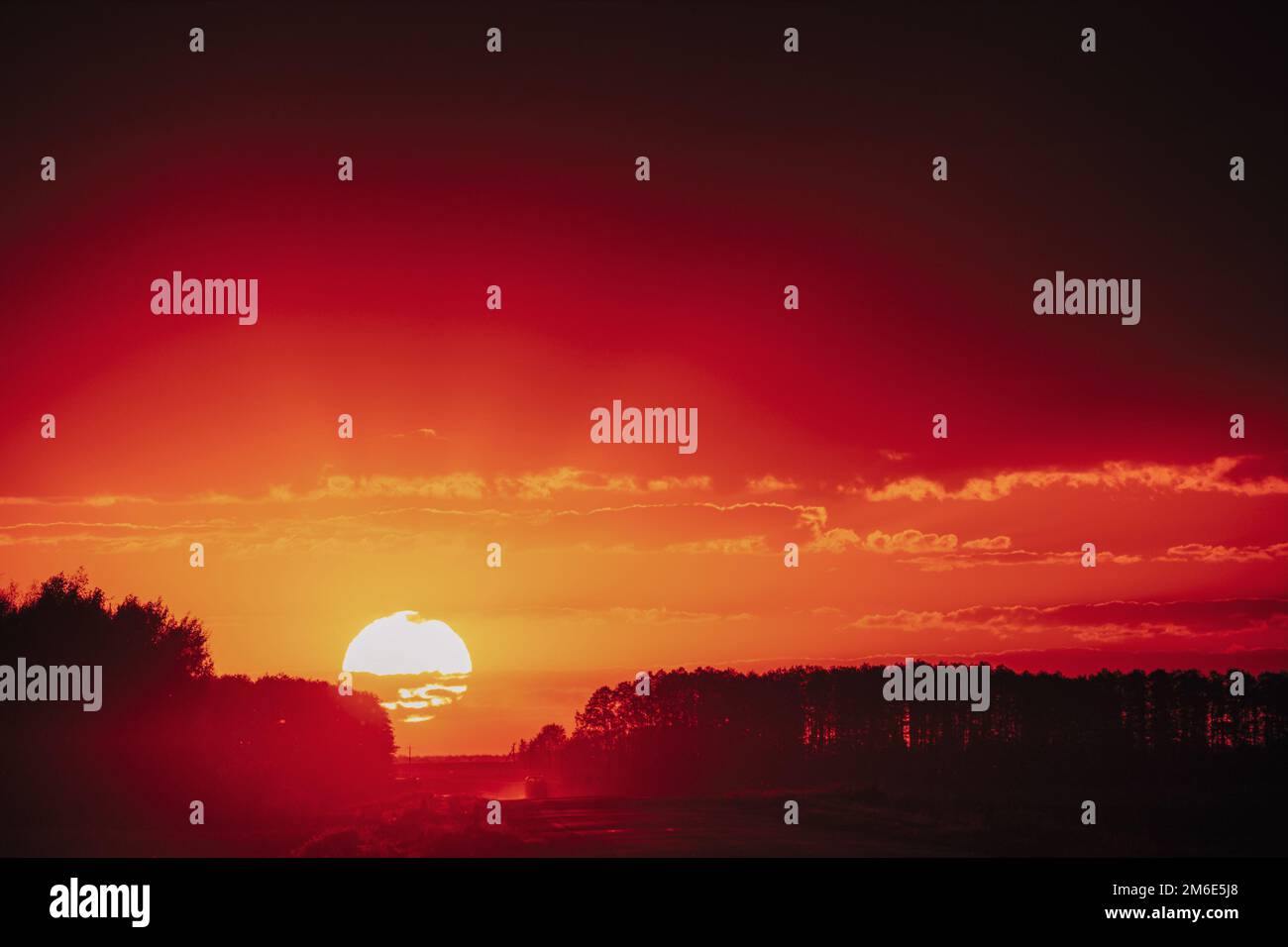 Big Sun in Vivid Beautiful Sunset Sunshine Above Summer Landscape ...