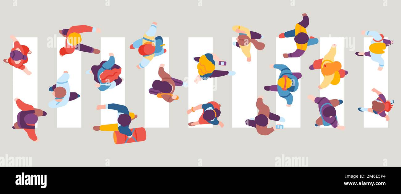 People walking across road at crosswalk. View from above. Pedestrians ...