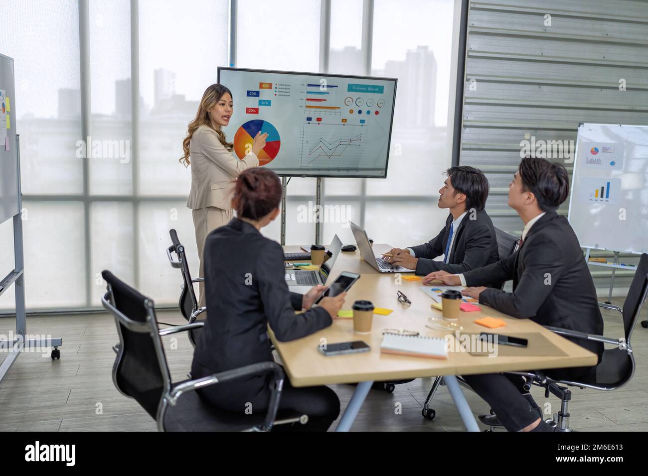 Employee meeting big screen tv presentation conference discussion ...