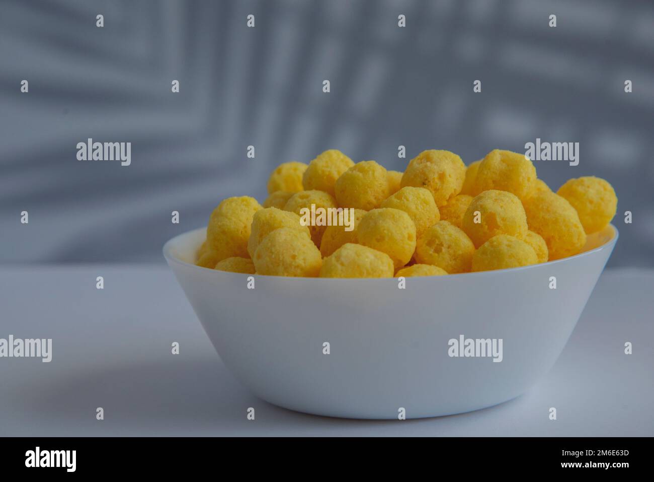 Delicious corn balls in white bowl Stock Photo - Alamy