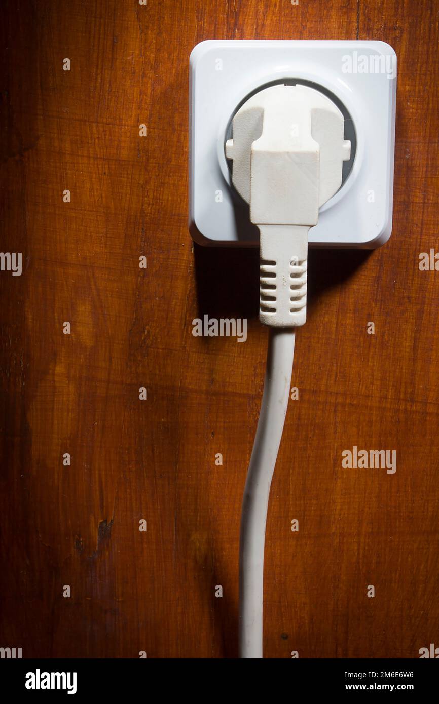 Socket with plug Stock Photo - Alamy