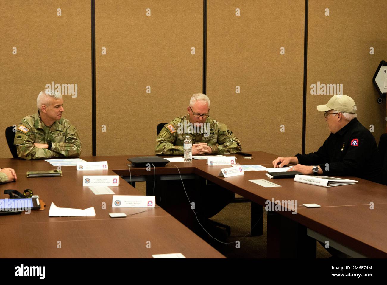 U.S. Army Lt. Gen. John R. Evans, center, commanding general of U.S. Army North, Maj. Gen ...