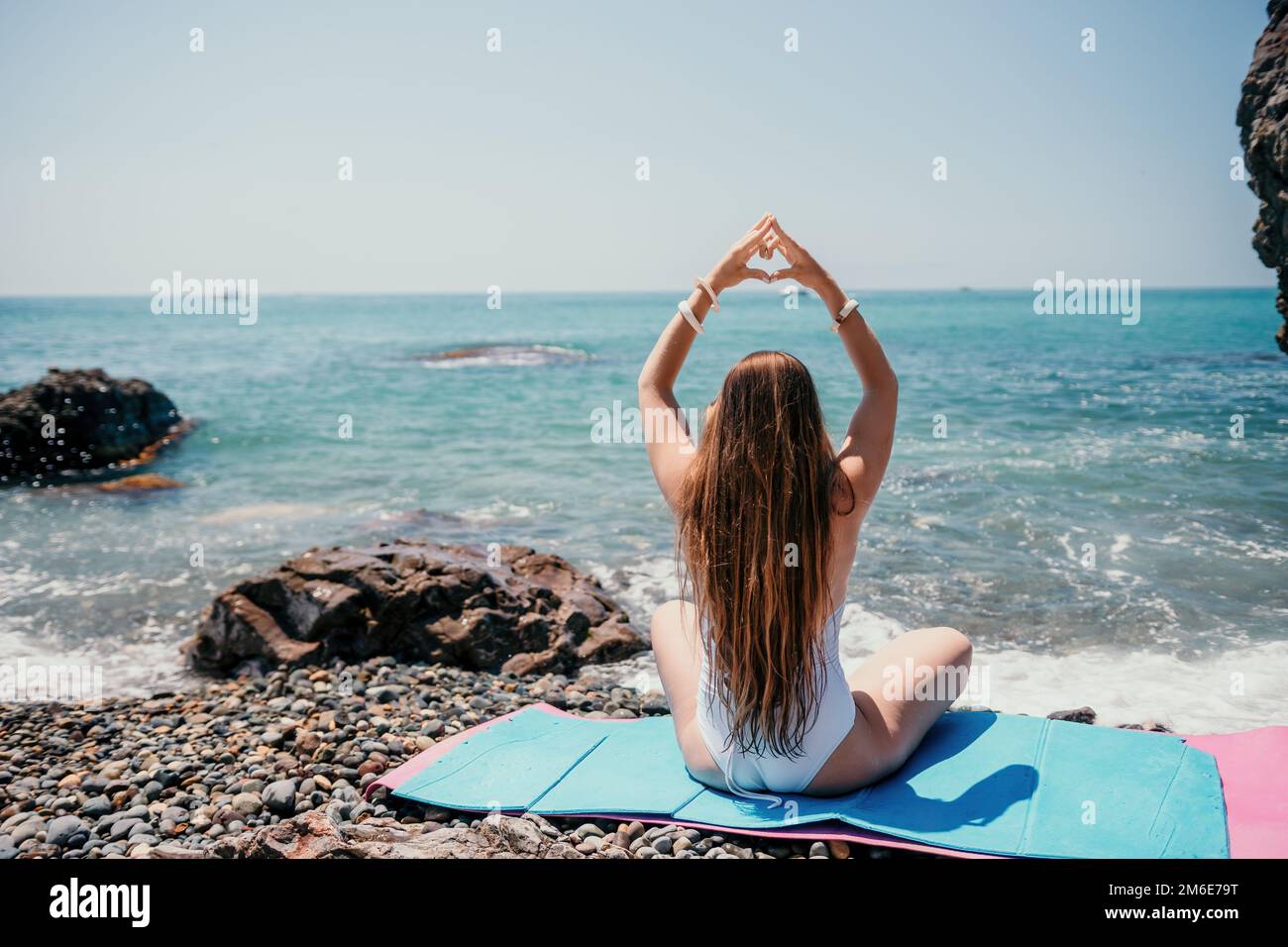 Woman yoga hand heart hi-res stock photography and images - Alamy